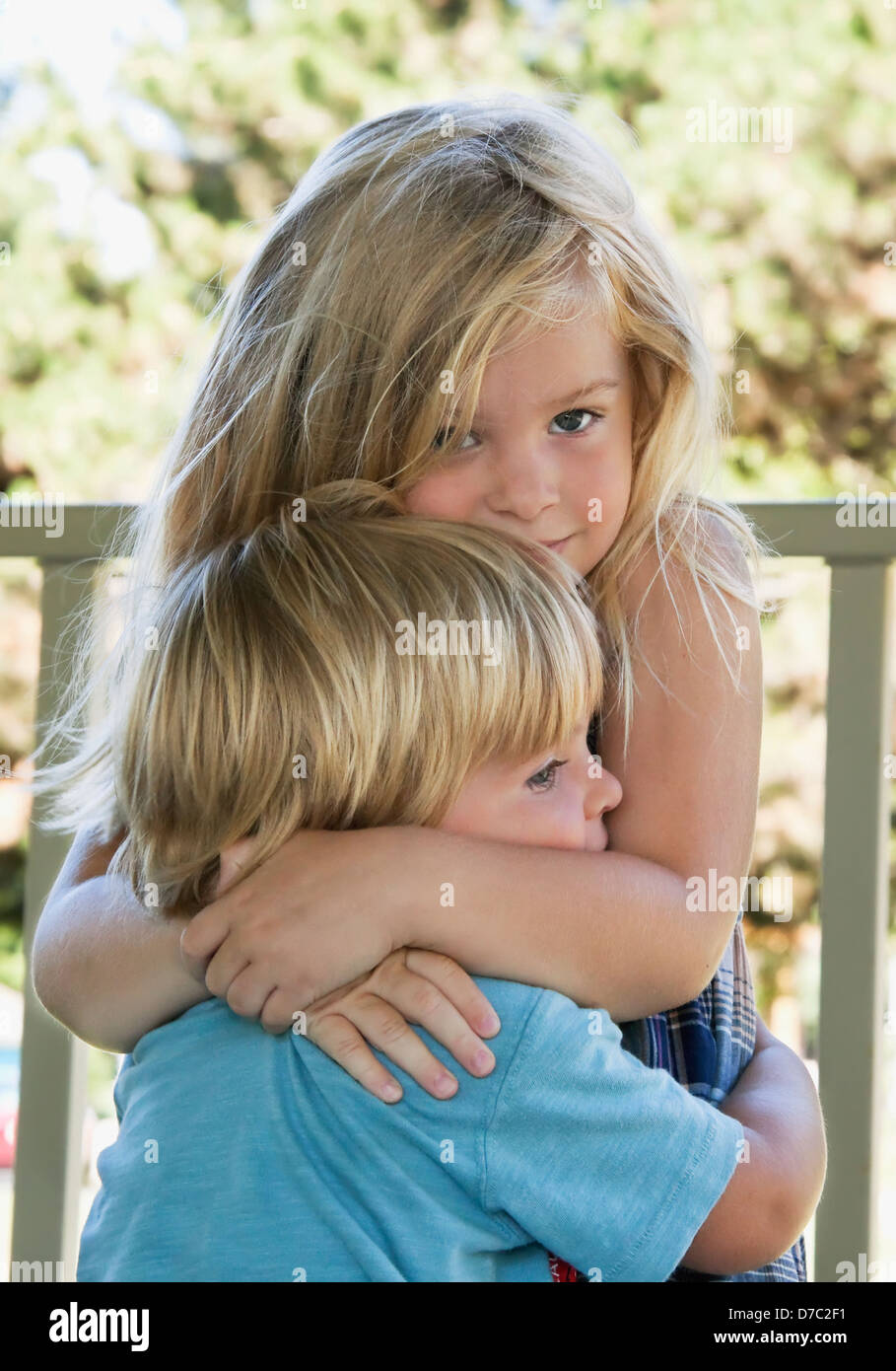 Younger brother siblings rear view hi-res stock photography and images - Alamy