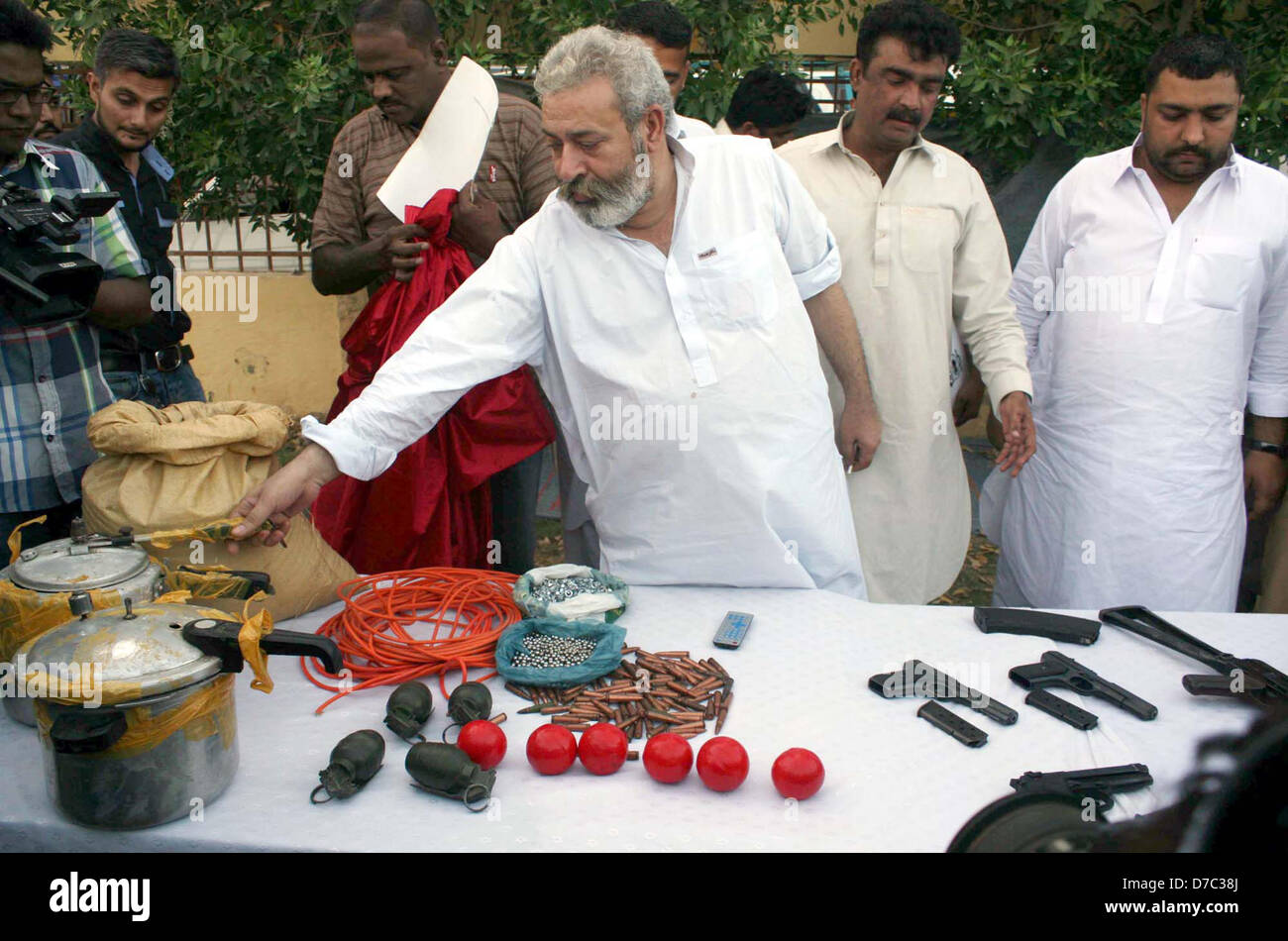 CID Police officials showing seized weapons that recovered from ...