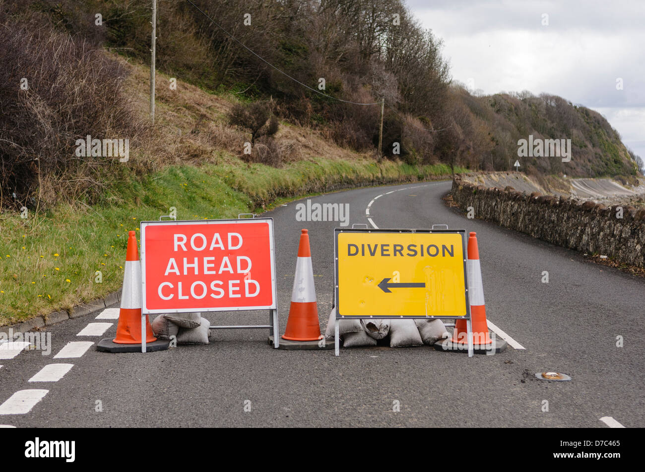 Road closed signs on a coastal road due to fallen rocks Stock Photo - Alamy