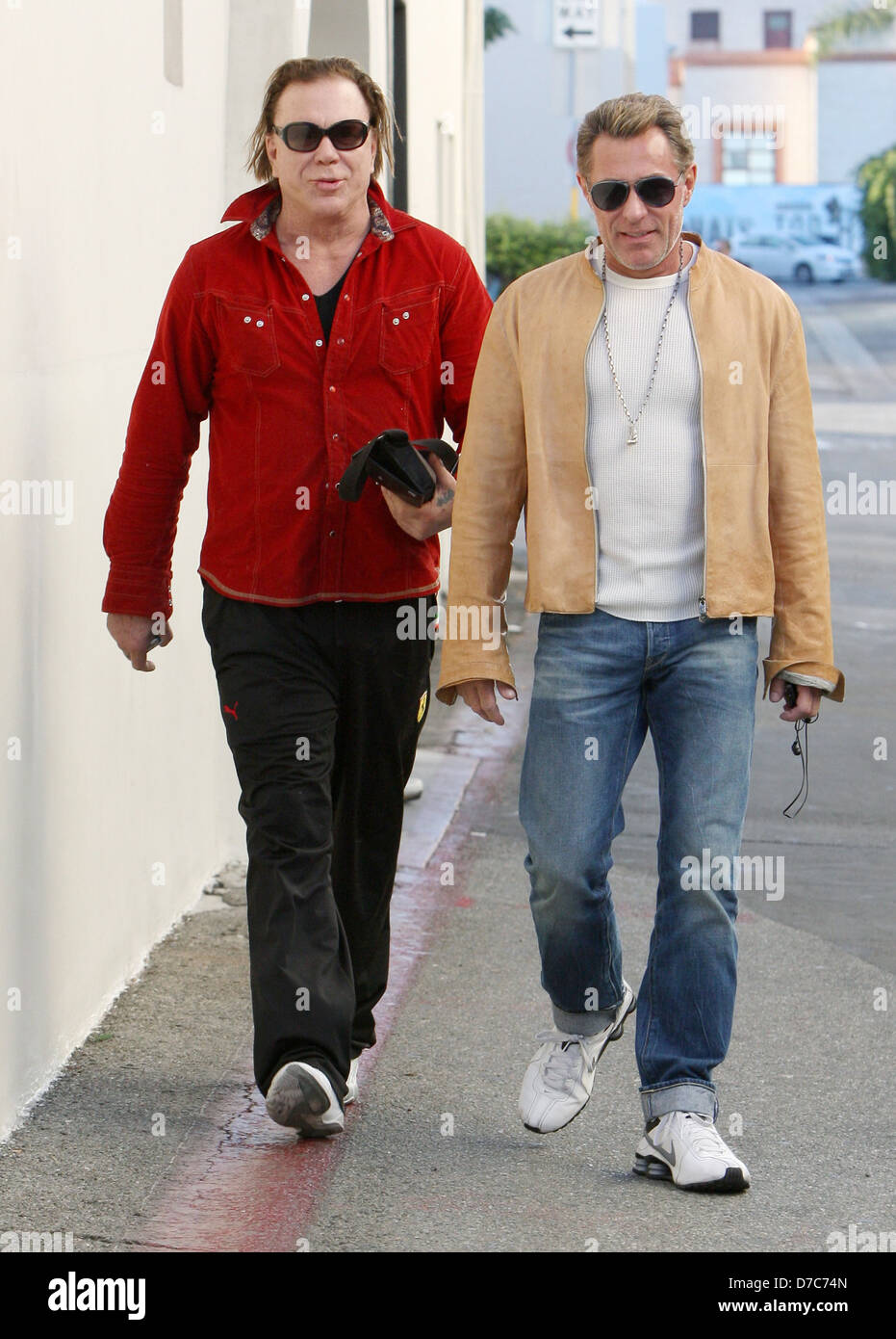 Mickey Rourke exits Cafe Roma in Beverly Hills wearing a red jacket and ...