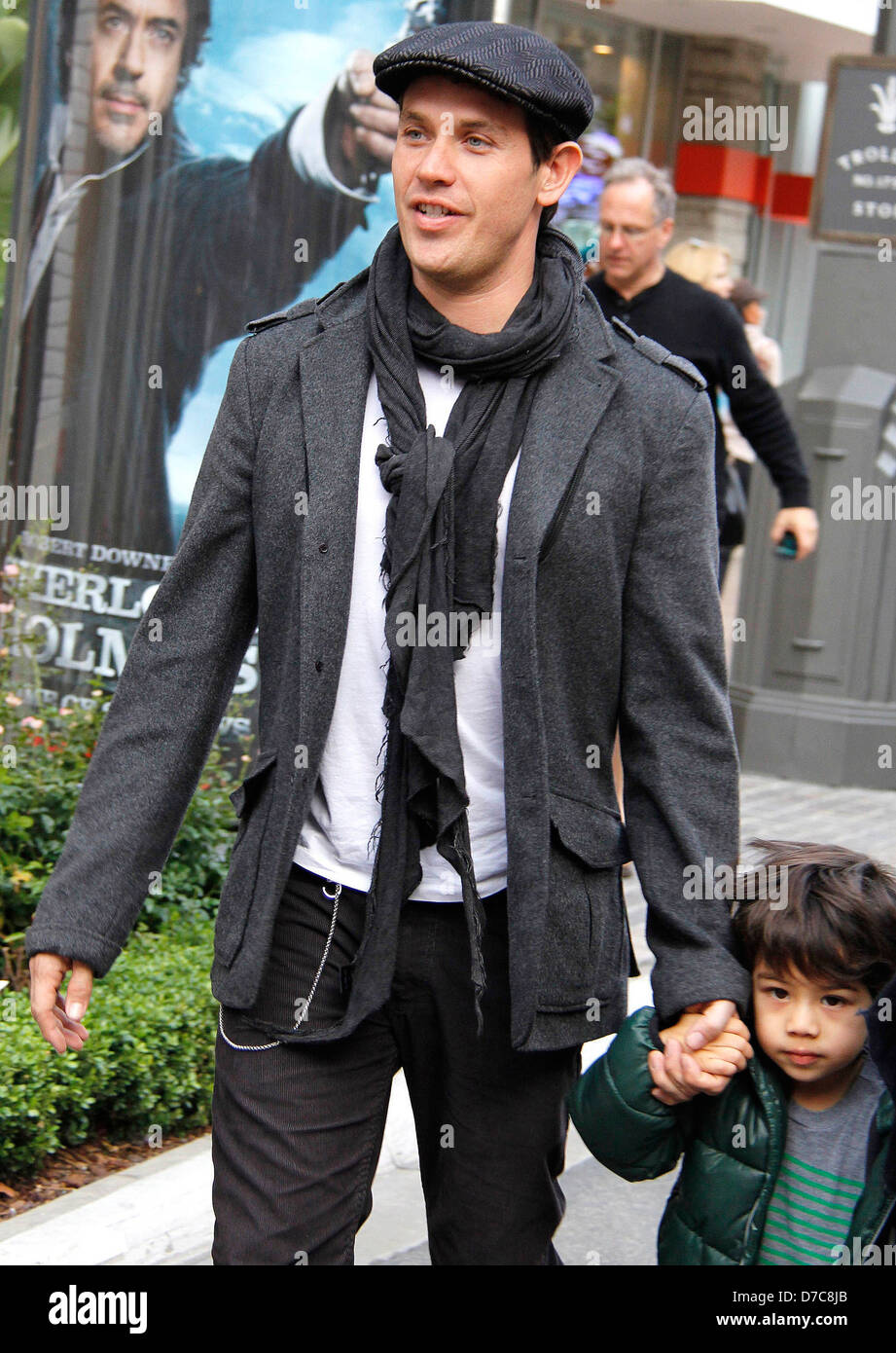 Kevin Alejandro shops with his family at The Grove Los Angeles ...