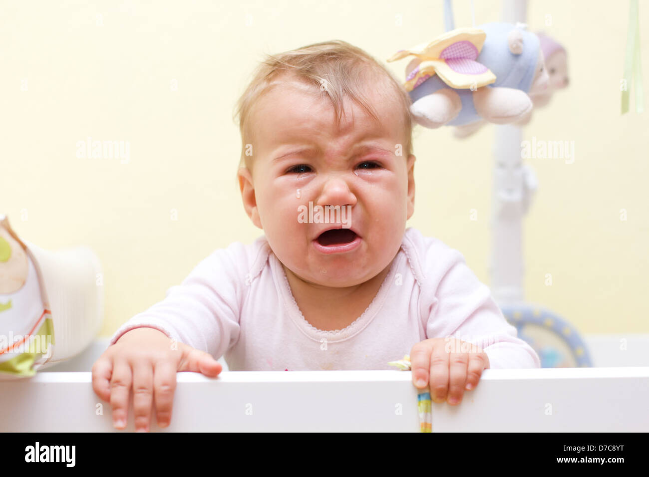 Portrait of crying baby girl Stock Photo - Alamy