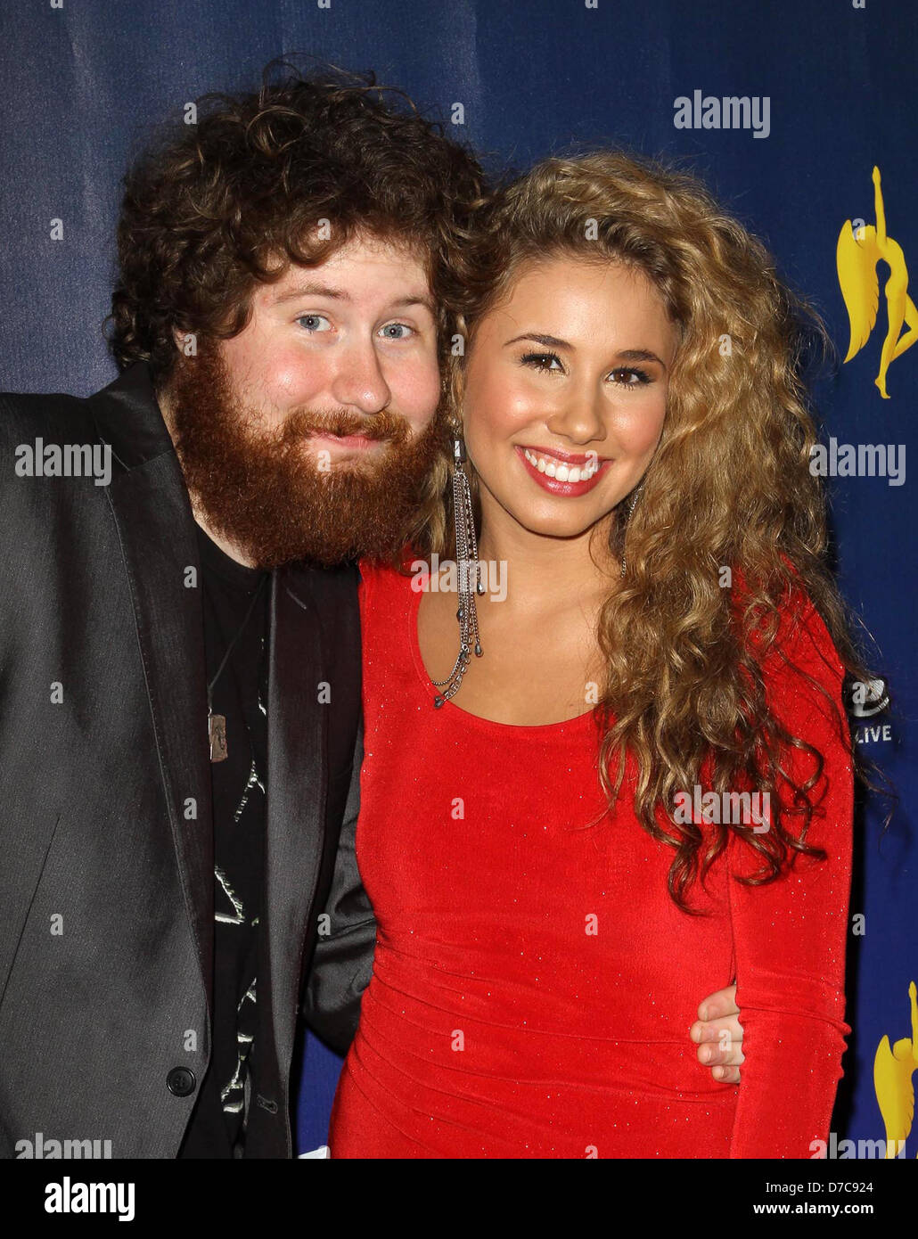 Casey Abrams and Haley Reinart The 4th annual holiday Christmas tree ...