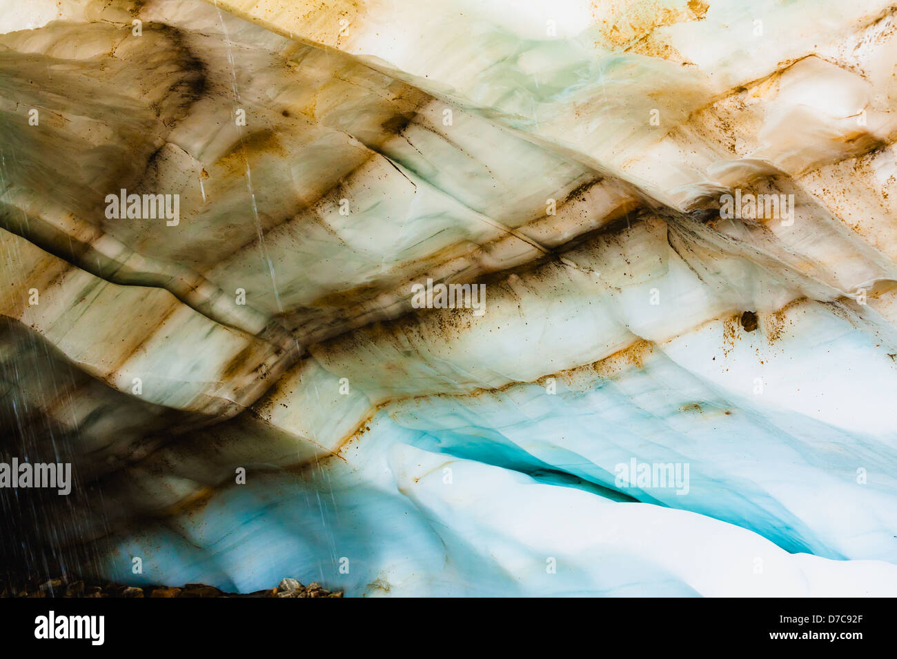 Veins of gravel seen in an ice cave under a glacier jasper national ...