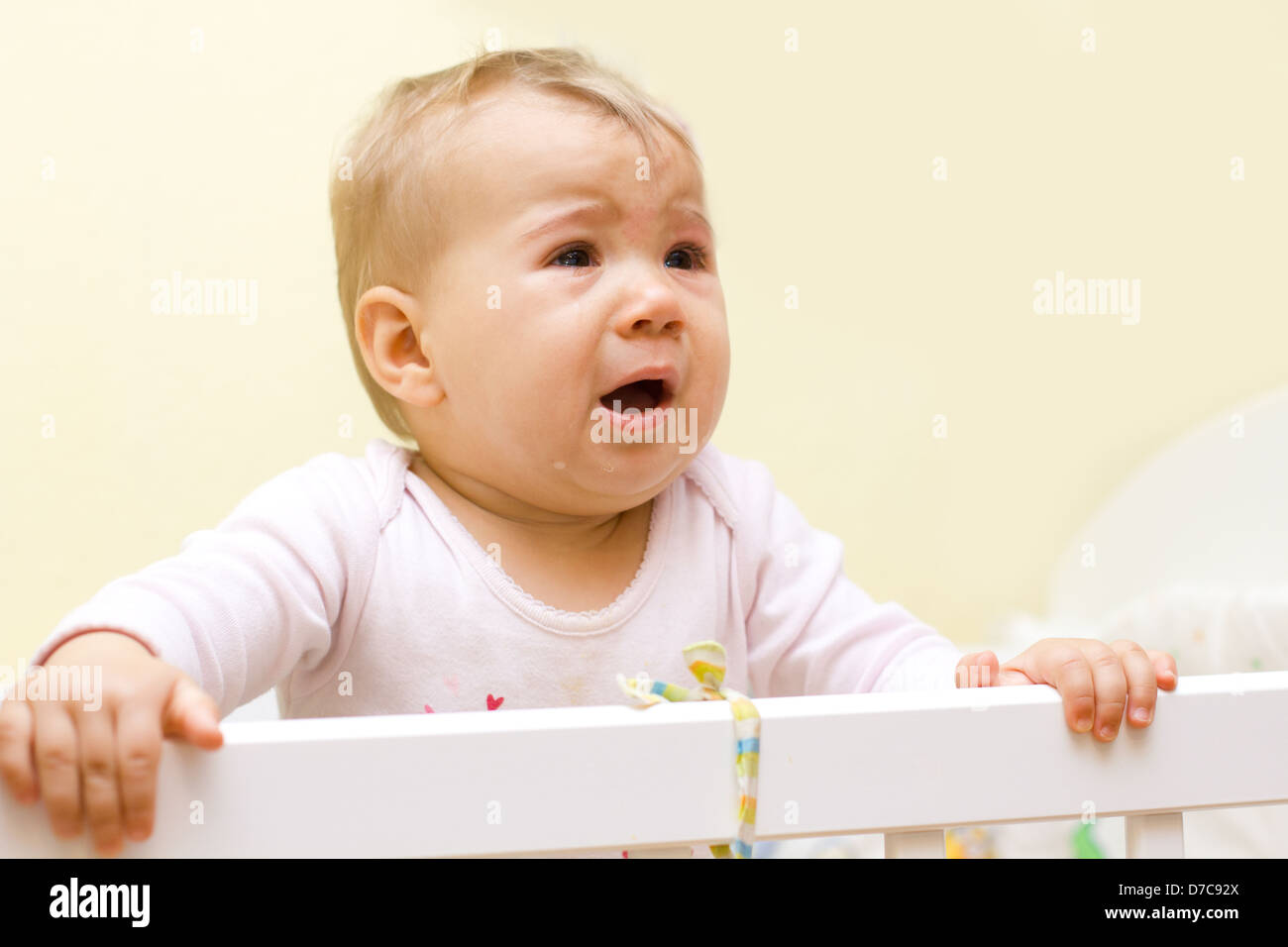 Portrait of crying baby girl Stock Photo - Alamy