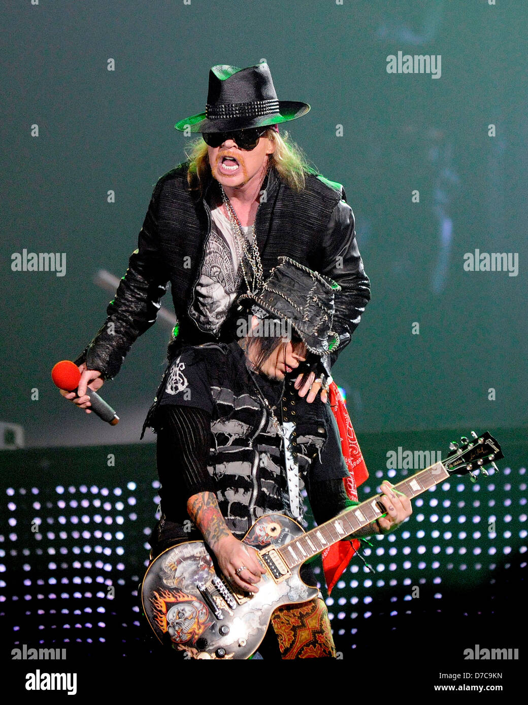 Axl Rose and DJ Ashba Guns N' Roses perform on stage at Copps Coliseum ...