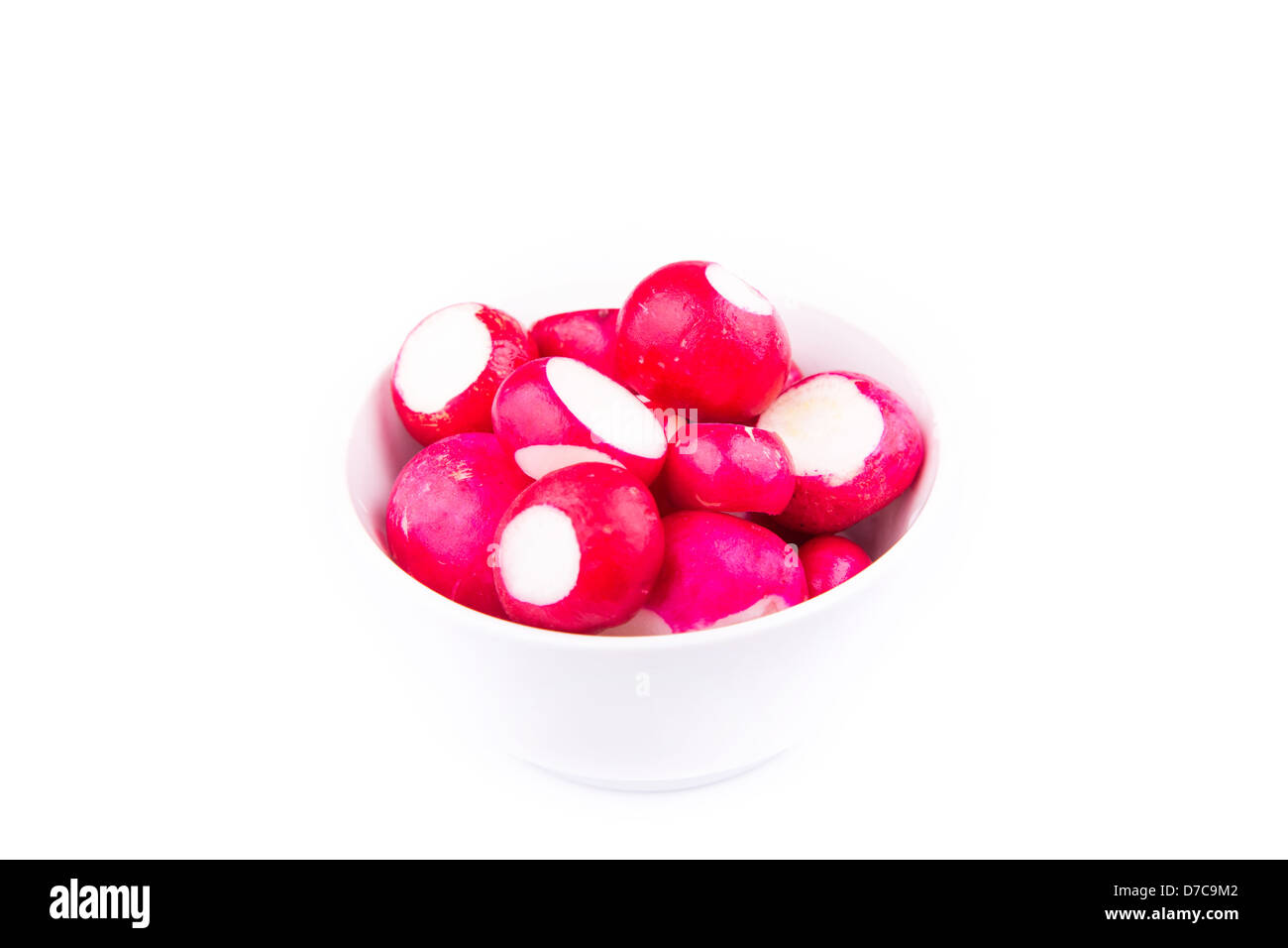 Fresh radish ready to eat served on a plate isolated on white Stock ...