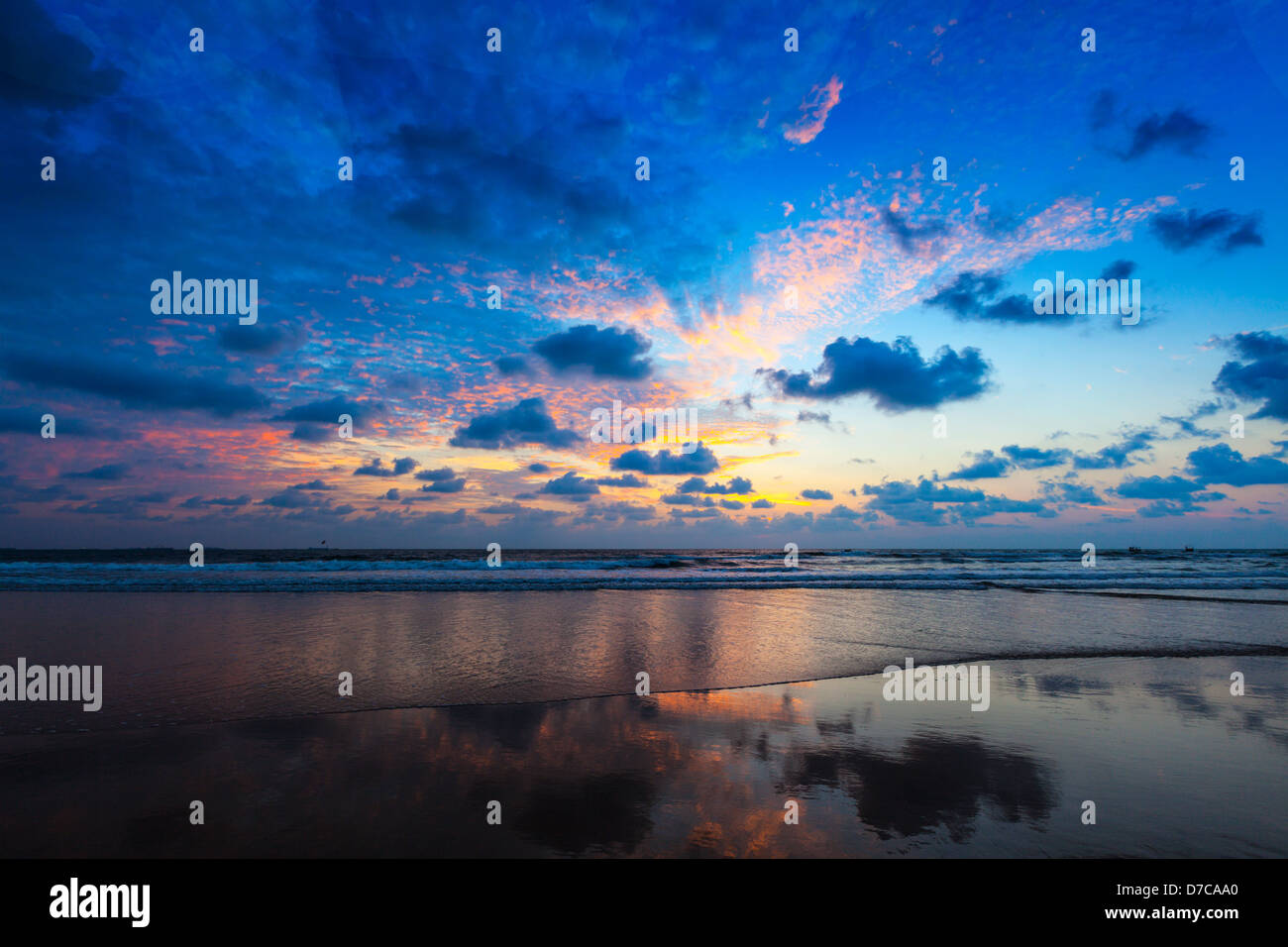 Sunset on Baga beach. Goa, India Stock Photo - Alamy