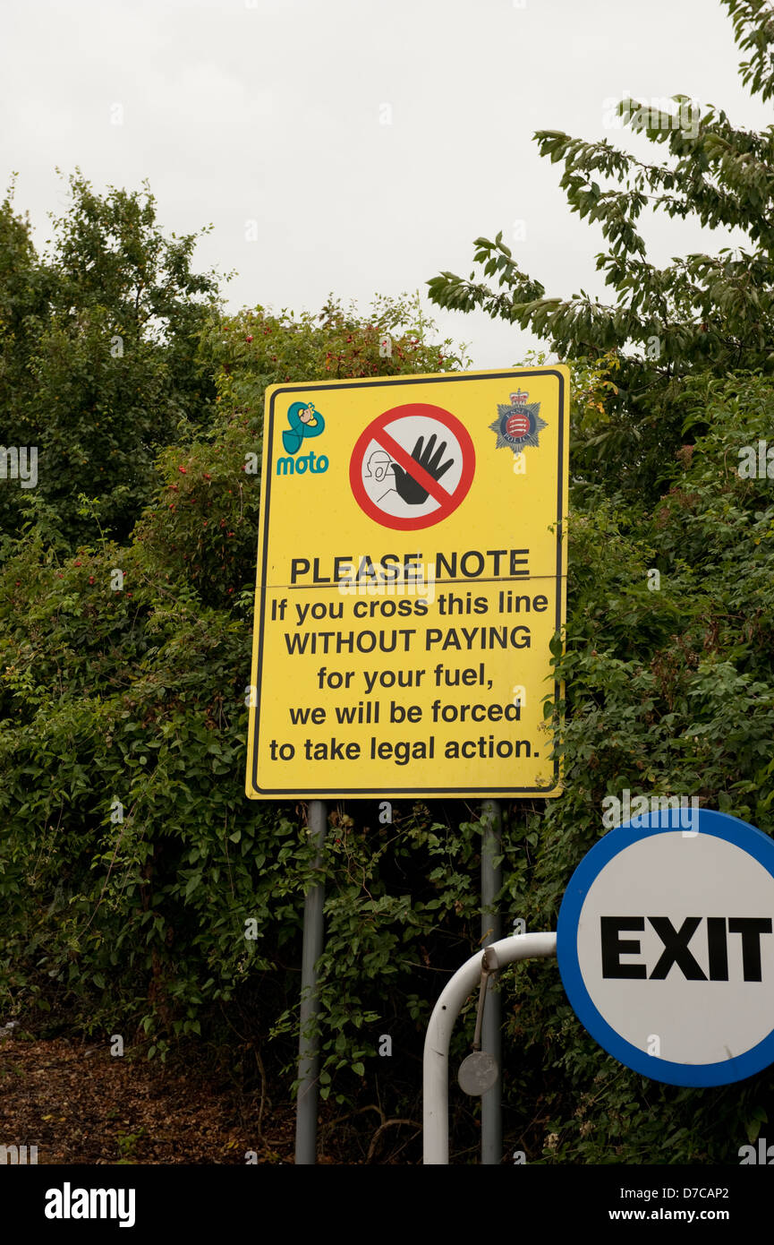 Gas Petrol Fuel station theft warning sign Stock Photo - Alamy