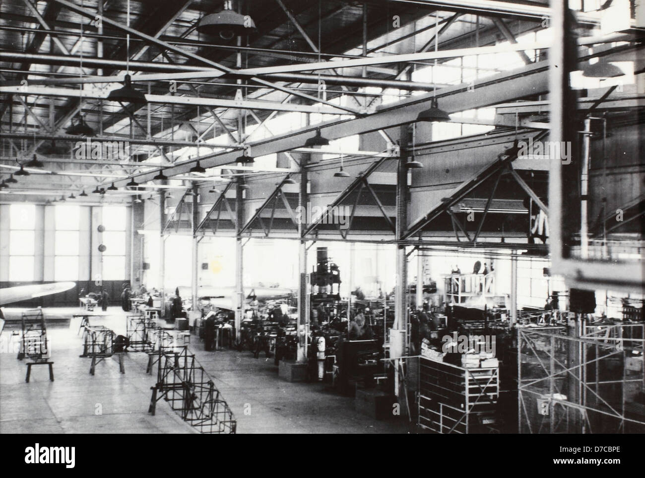 This photograph shows the interior of a factory, likely focused on ...
