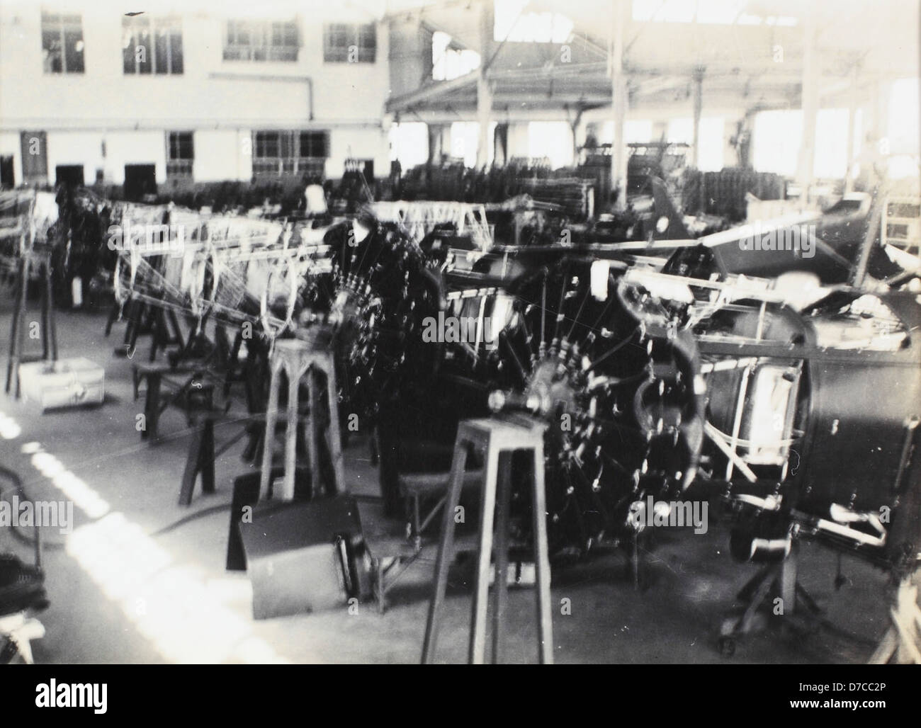 This image depicts a factory interior, showcasing the workspace where ...