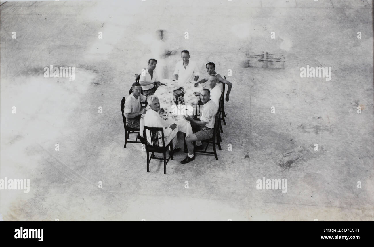 Seven Men at a Dinner Table Stock Photo - Alamy