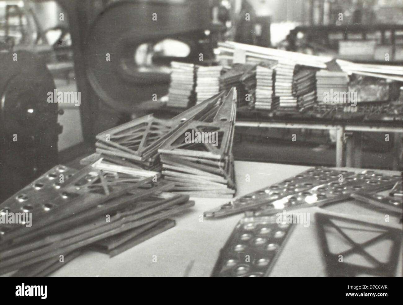 A photograph showing various parts of an aircraft, possibly in the ...