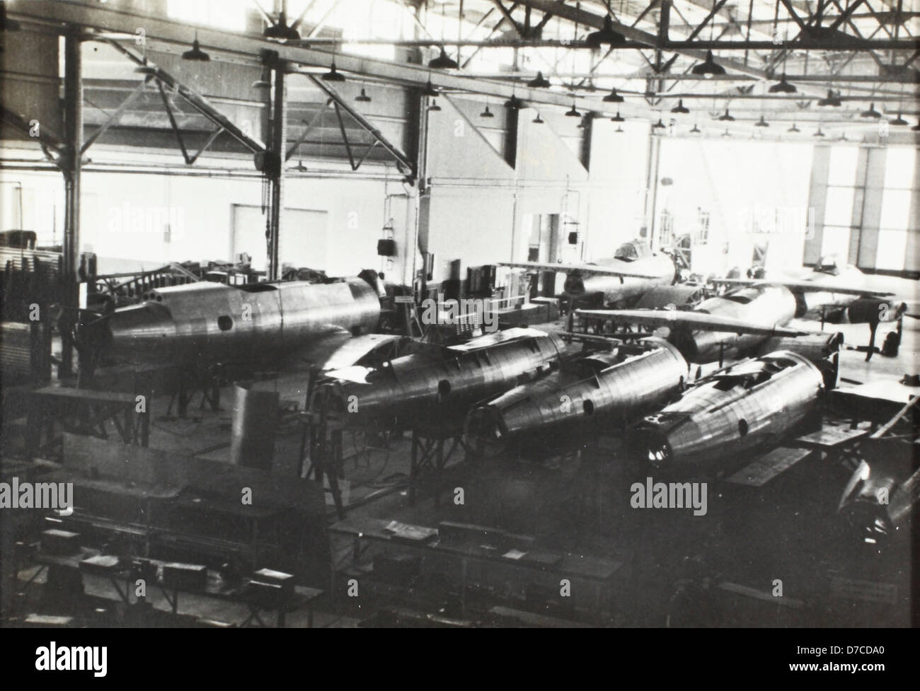 This image showcases the interior of a factory during the production of ...