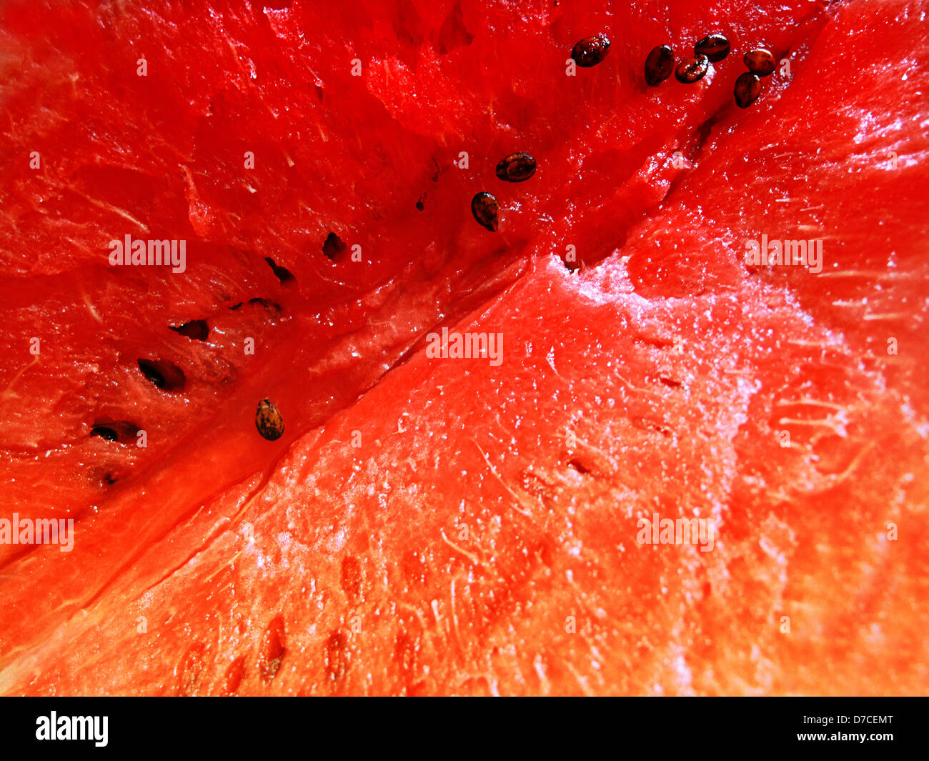 ripe red watermelon close up background Stock Photo - Alamy