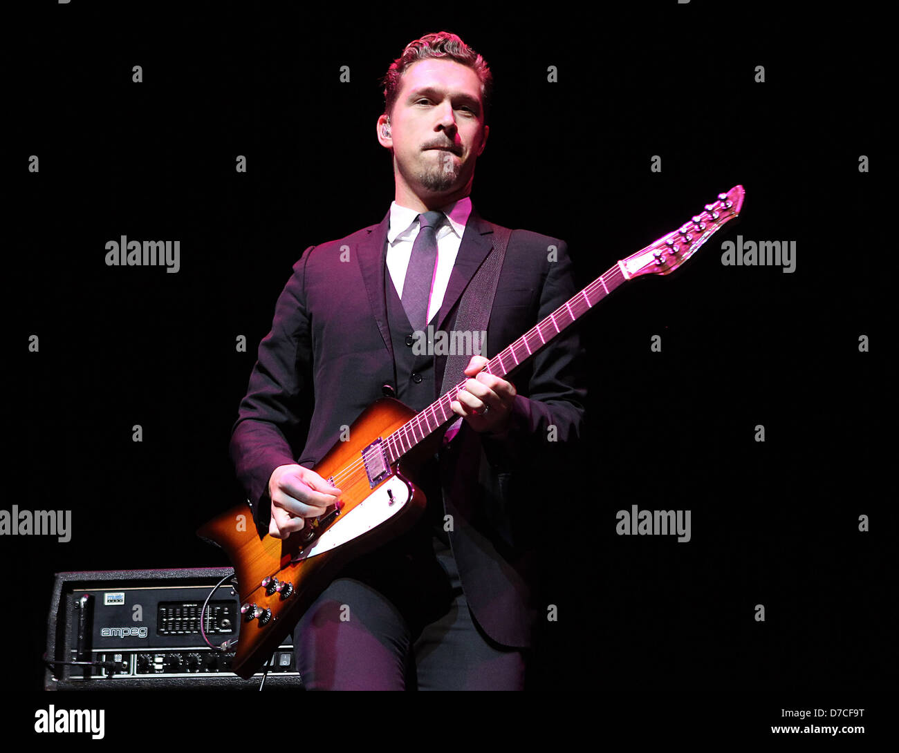 Isaac Hanson of Hanson performing on stage of their 'Shout It Out ...