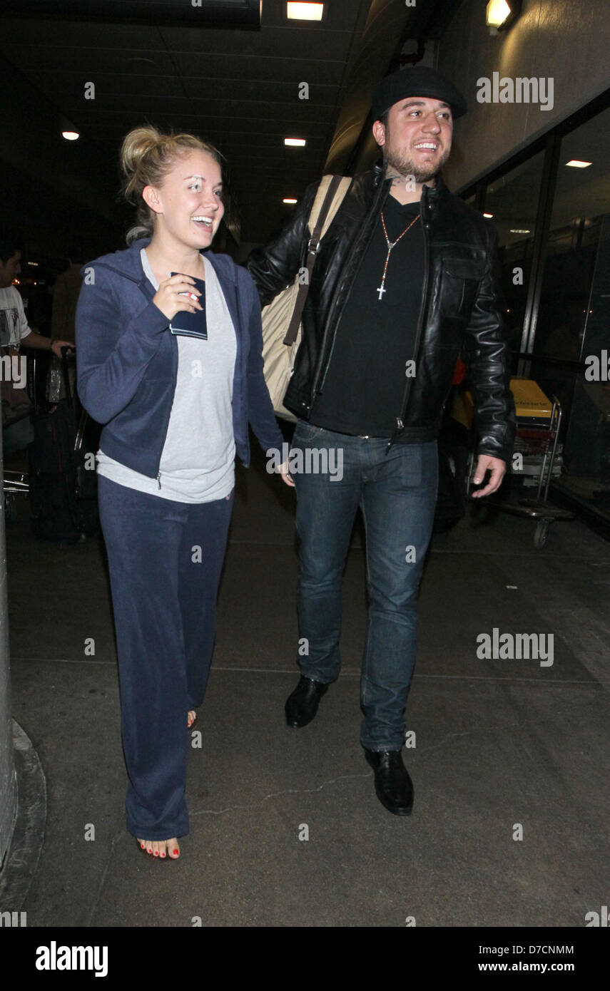 Tiffany Thornton and her fiance Christopher Carney arrive at LAX ...