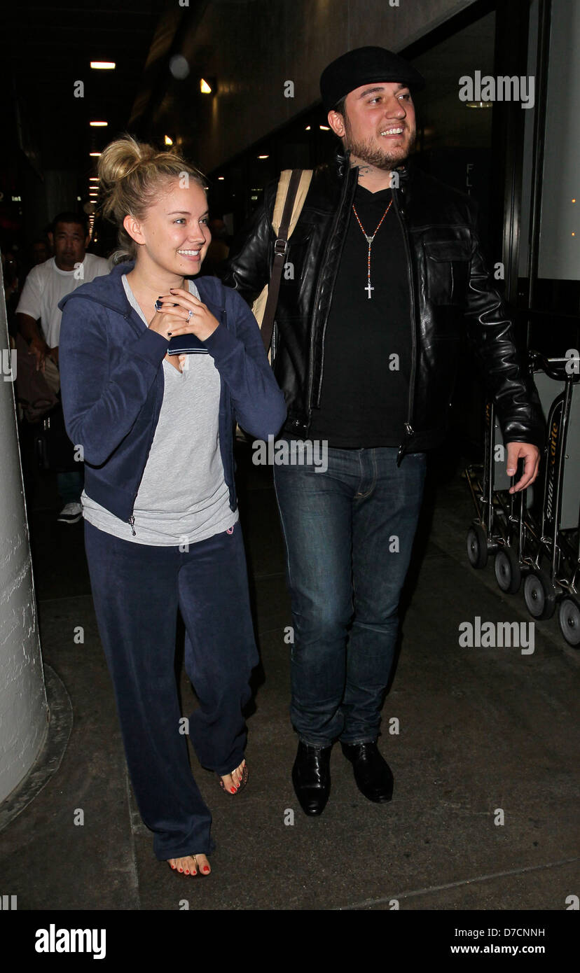 Tiffany Thornton and her fiance Christopher Carney arrive at LAX ...
