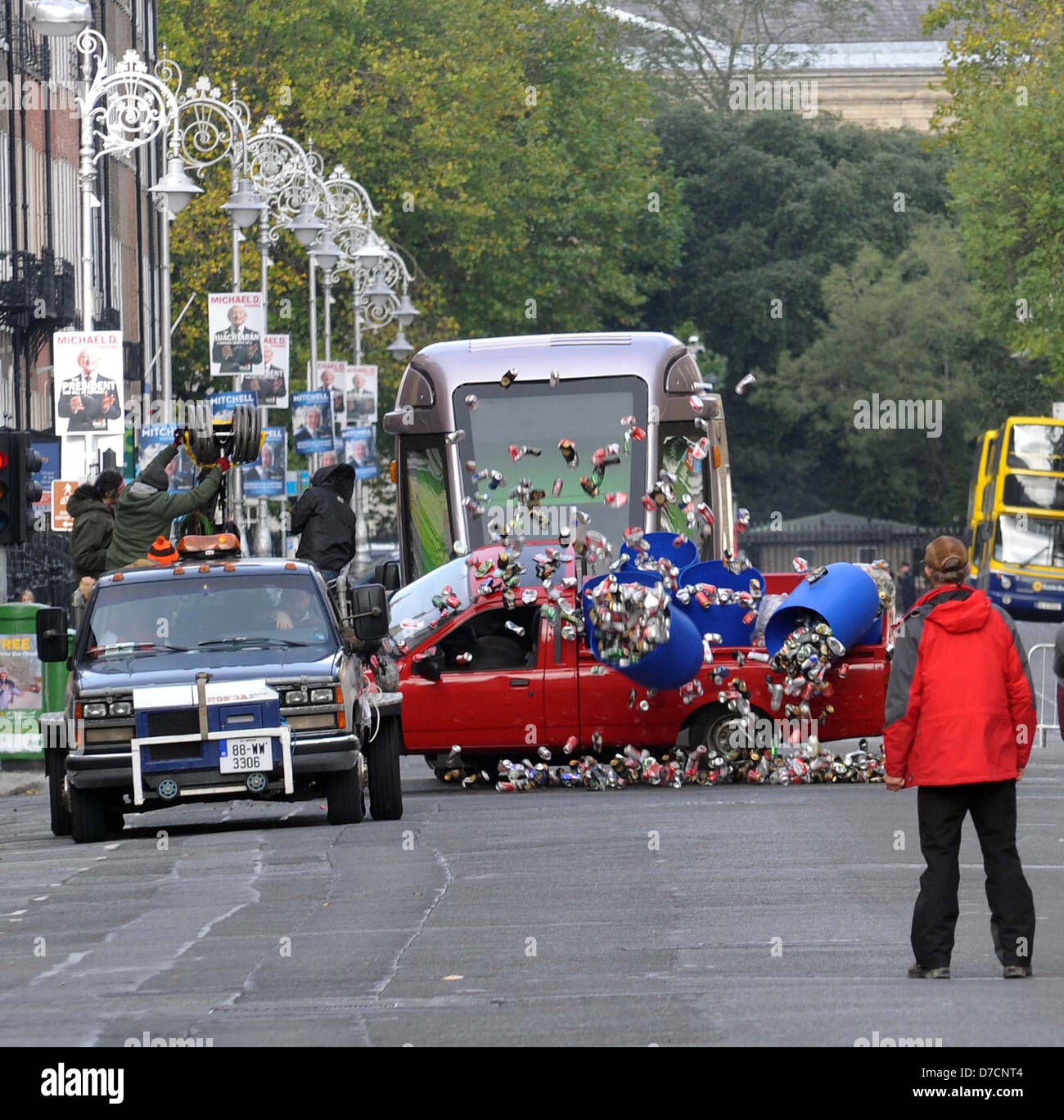 A fake tram crashes into a pickup truck during a stunt scene for ...