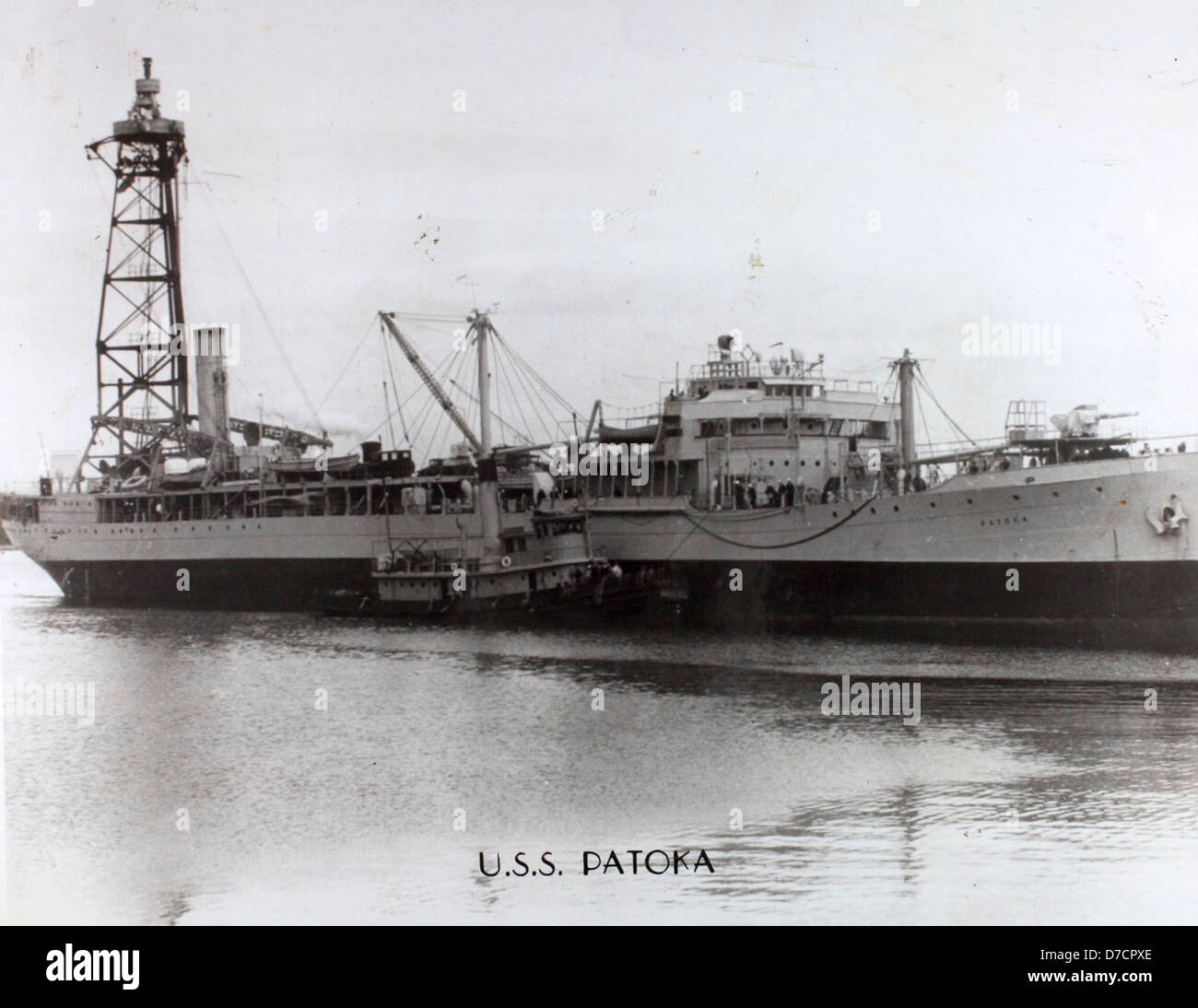 This image depicts the USS Patoka, serving as an airship tender and ...