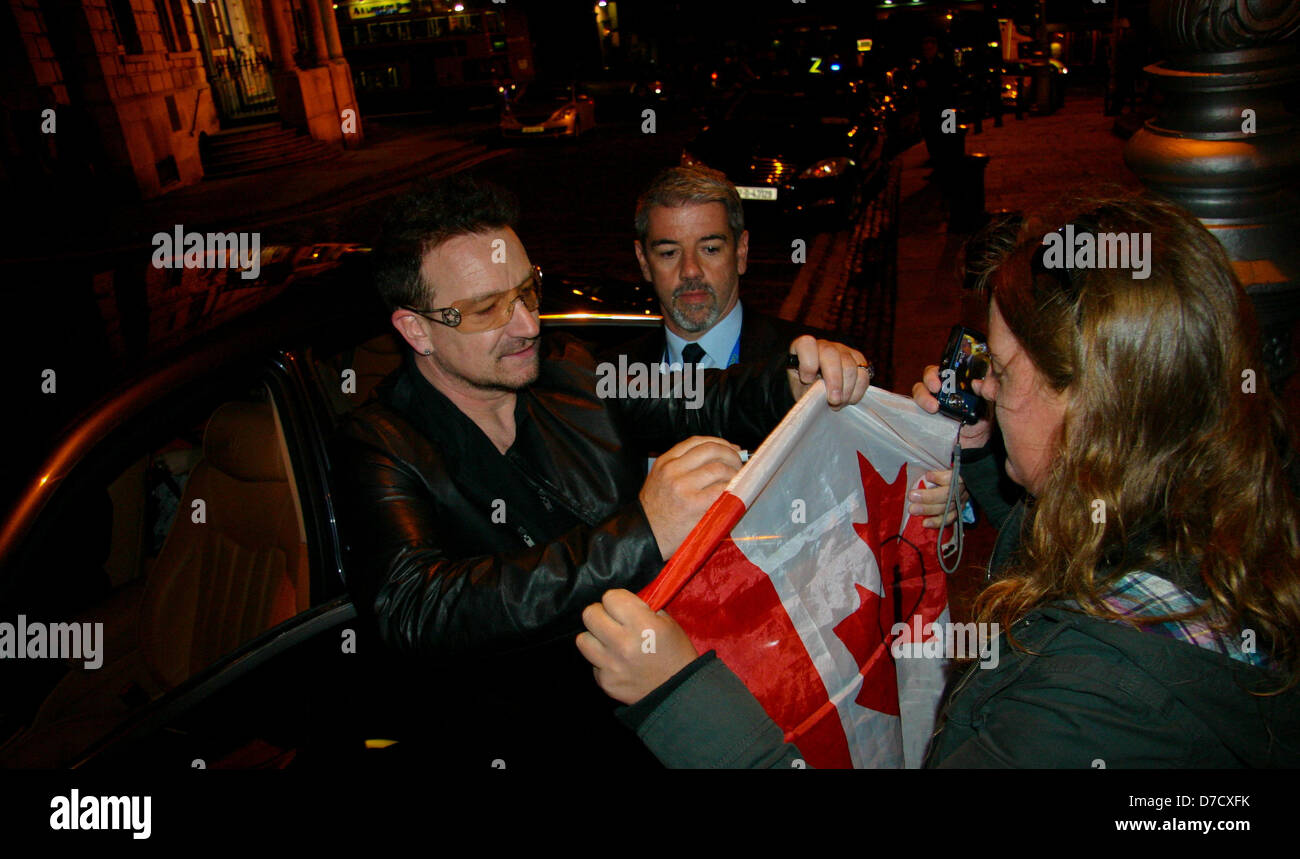 Bono of U2 signs autographs and poses for photos with fans at Dublin ...