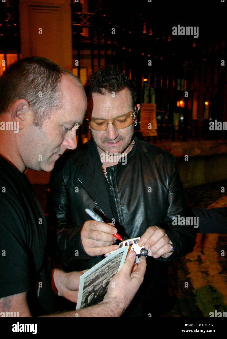 Bono of U2 signs autographs and poses for photos with fans at Dublin ...