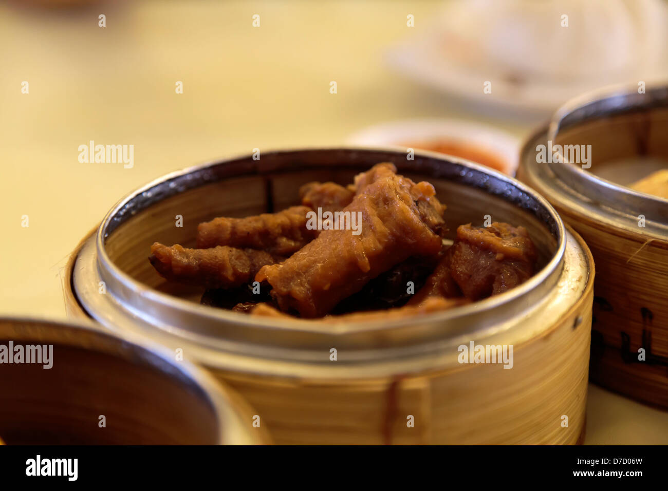 A dim sum dish of chicken feet Stock Photo - Alamy