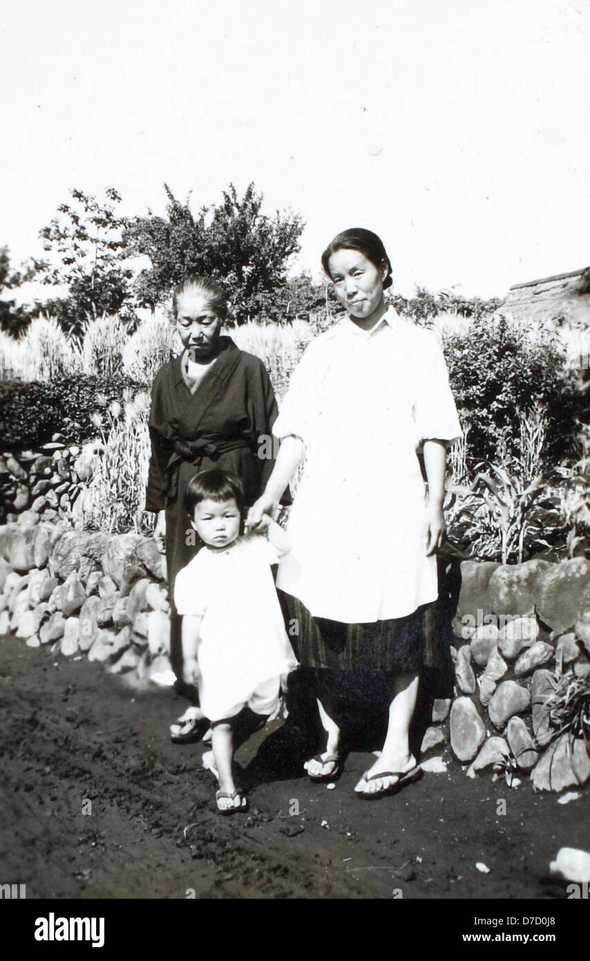 A photograph from Charles Daniels' album showing people in Honshu ...