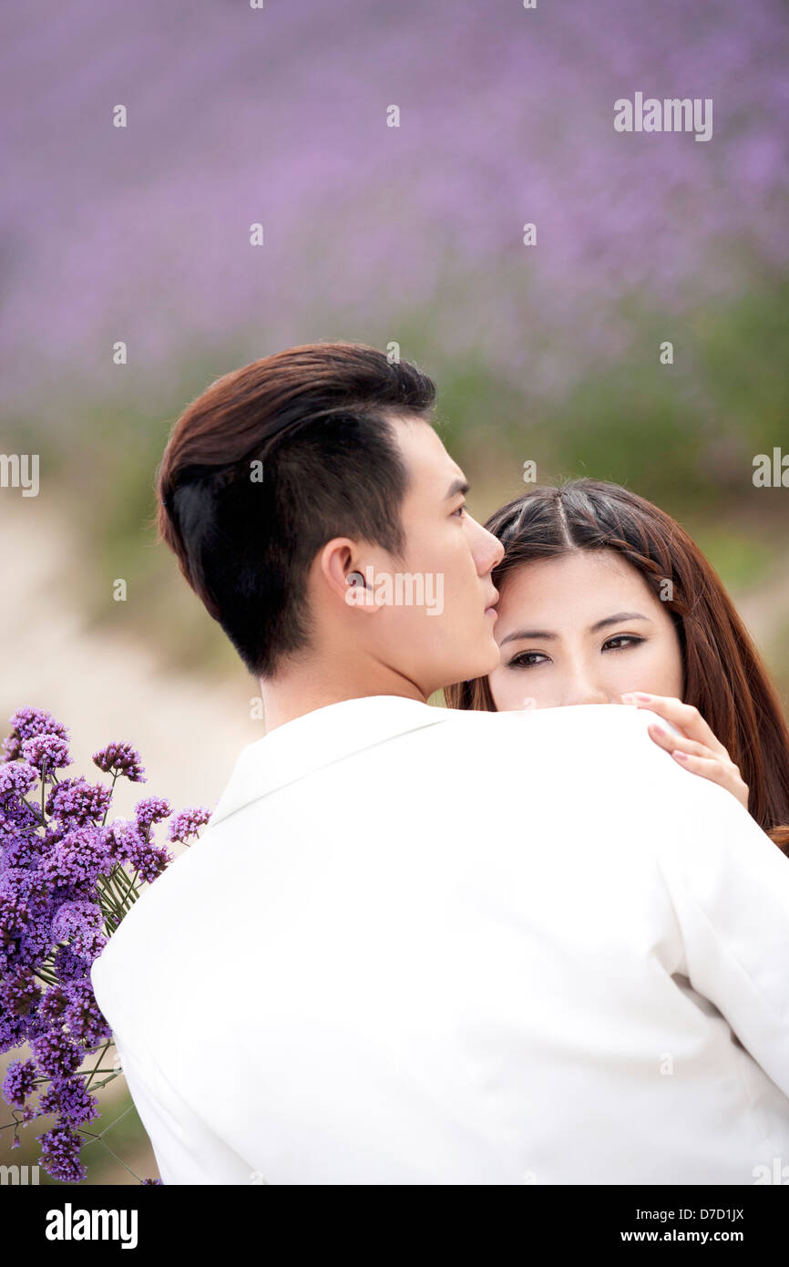Romantic Lavender wedding couple Stock Photo - Alamy
