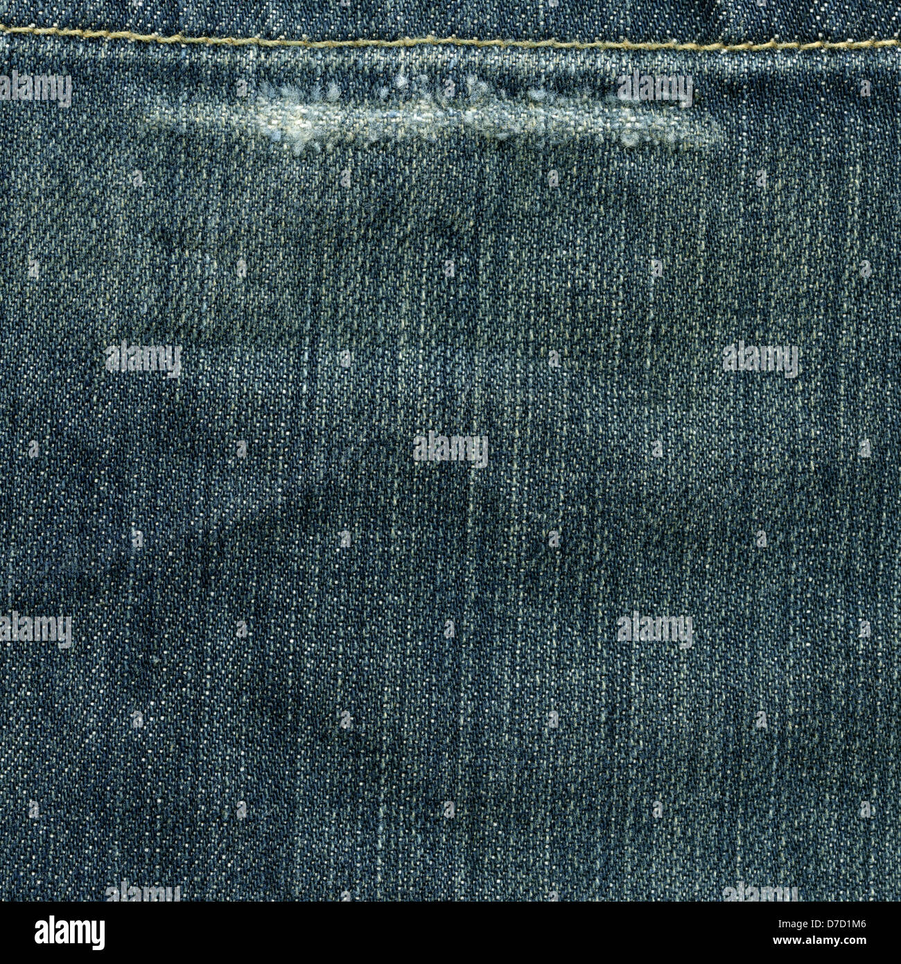High resolution scan blue denim fabric wear-out mark stitch crossing ...