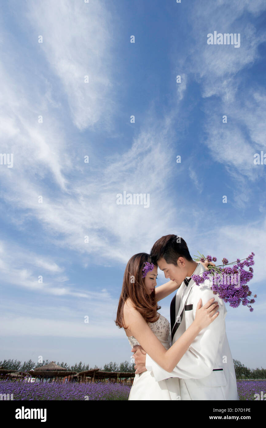 Romantic Lavender wedding couple Stock Photo - Alamy