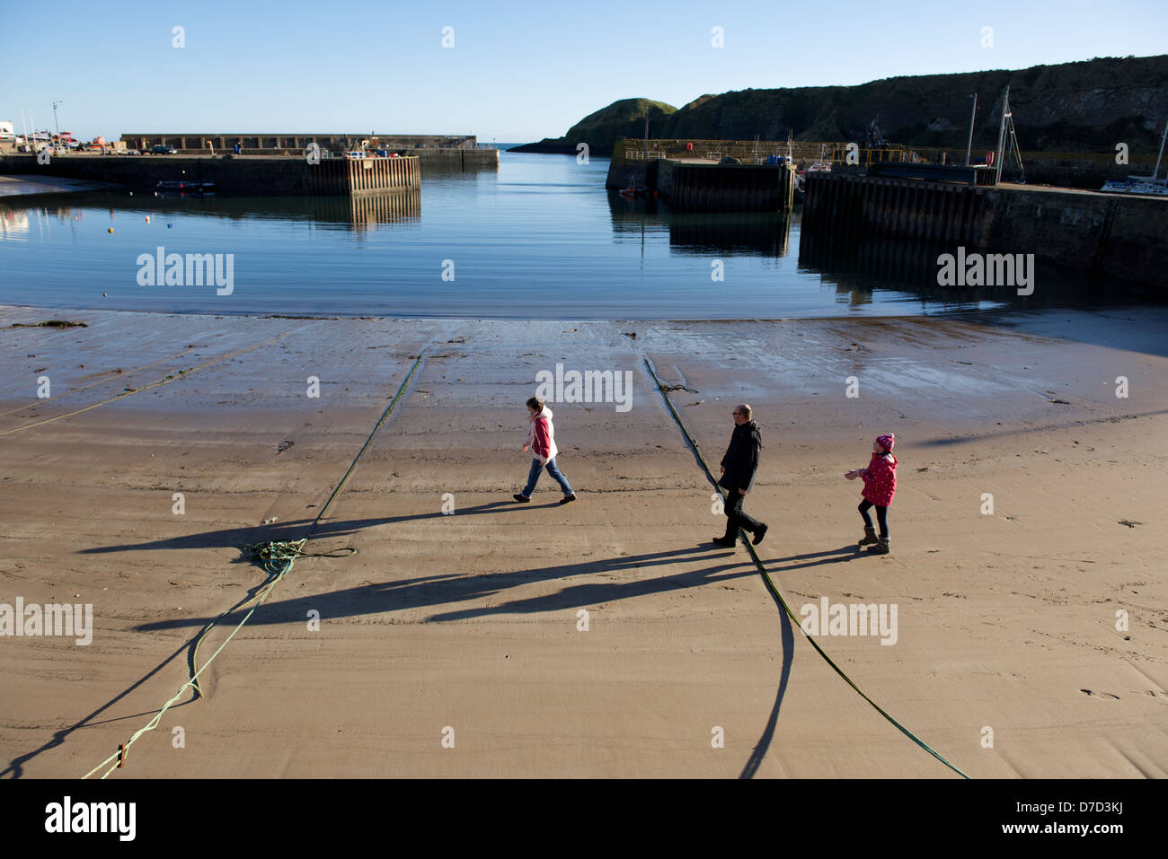 Walking in the harbour Stock Photo - Alamy