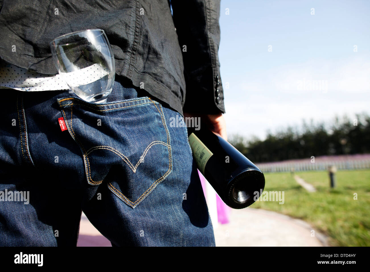 A man and the empty glass back to the camera Stock Photo - Alamy