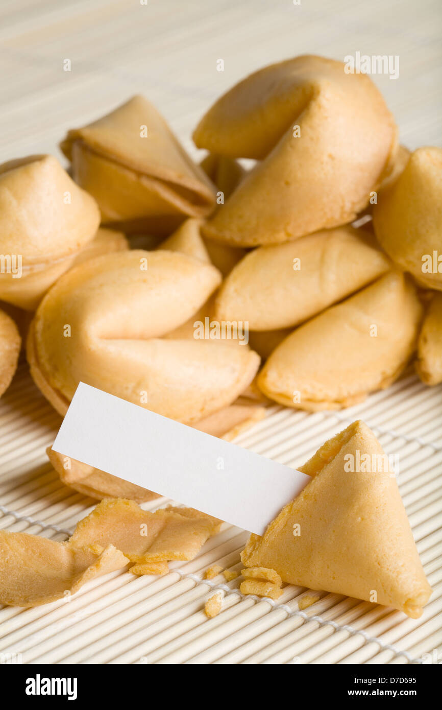 fortune cookie with blank fortune paper for your own text, shot closeup ...