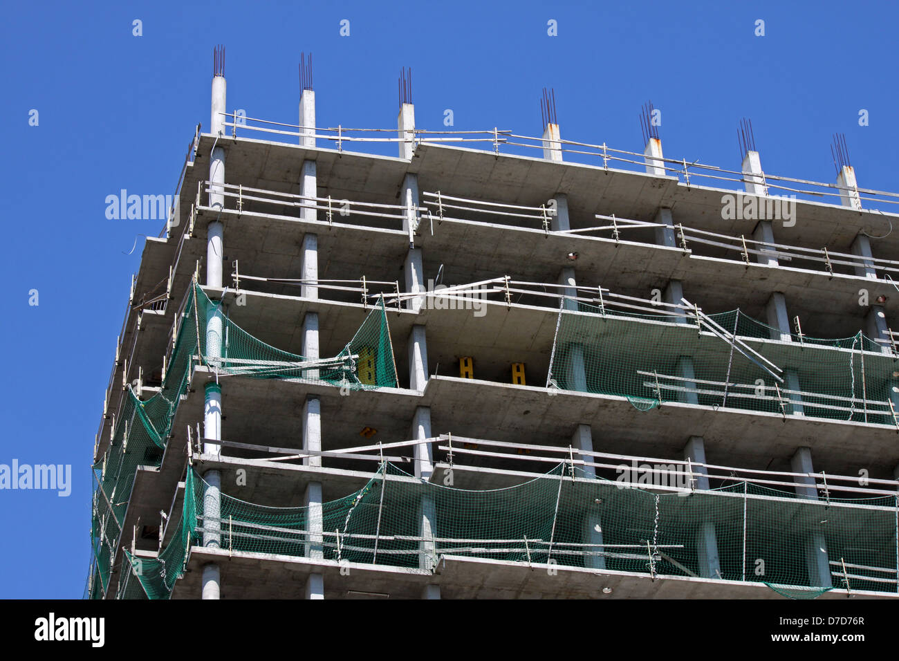 building under construction over blue sky Stock Photo - Alamy