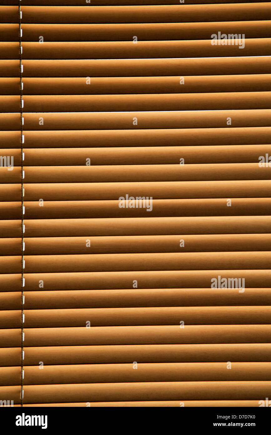 Closed Venetian blinds, back lit by the sun Stock Photo - Alamy
