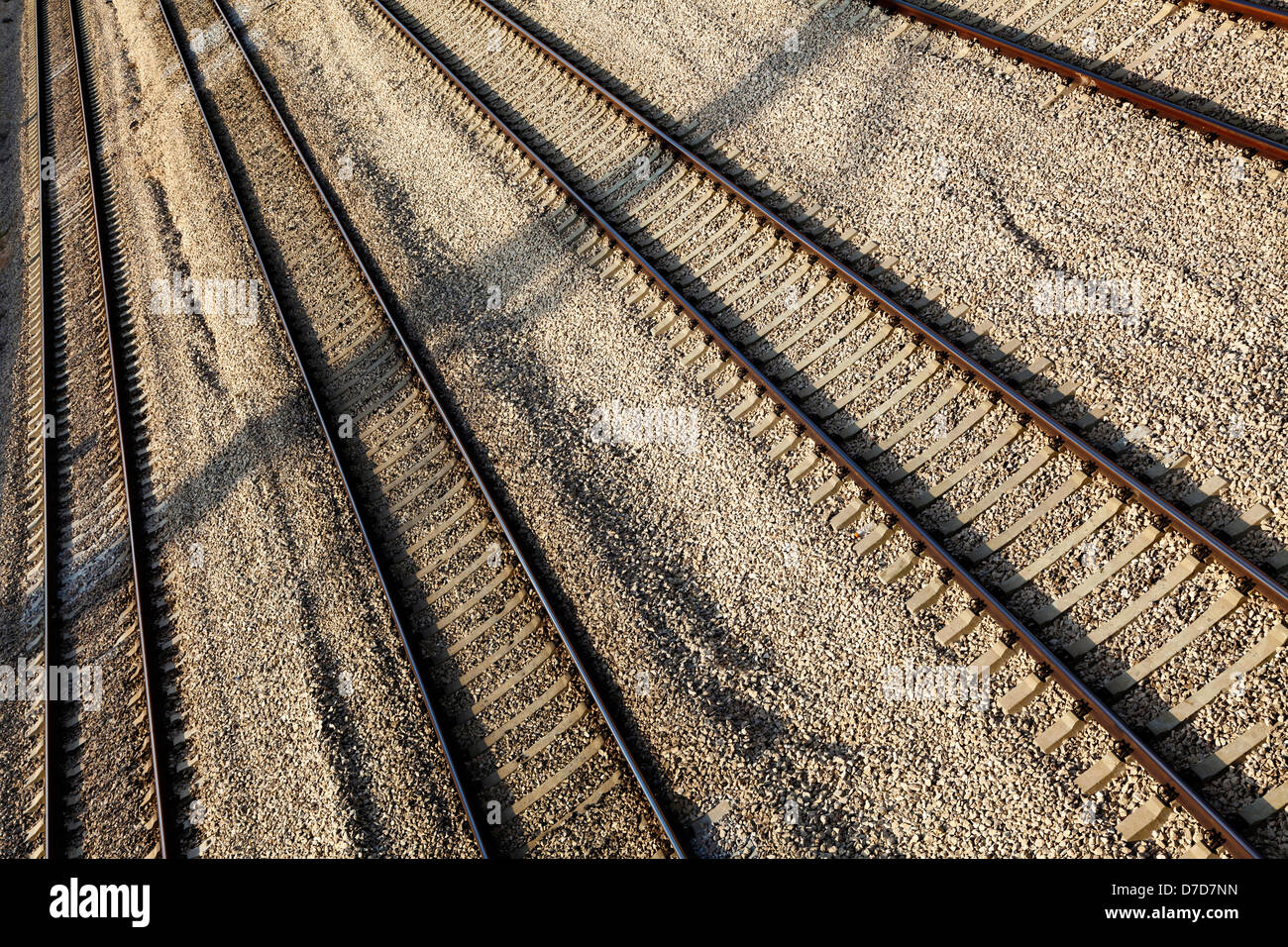 High angle tilted view of four sets of railroad tracks Stock Photo - Alamy