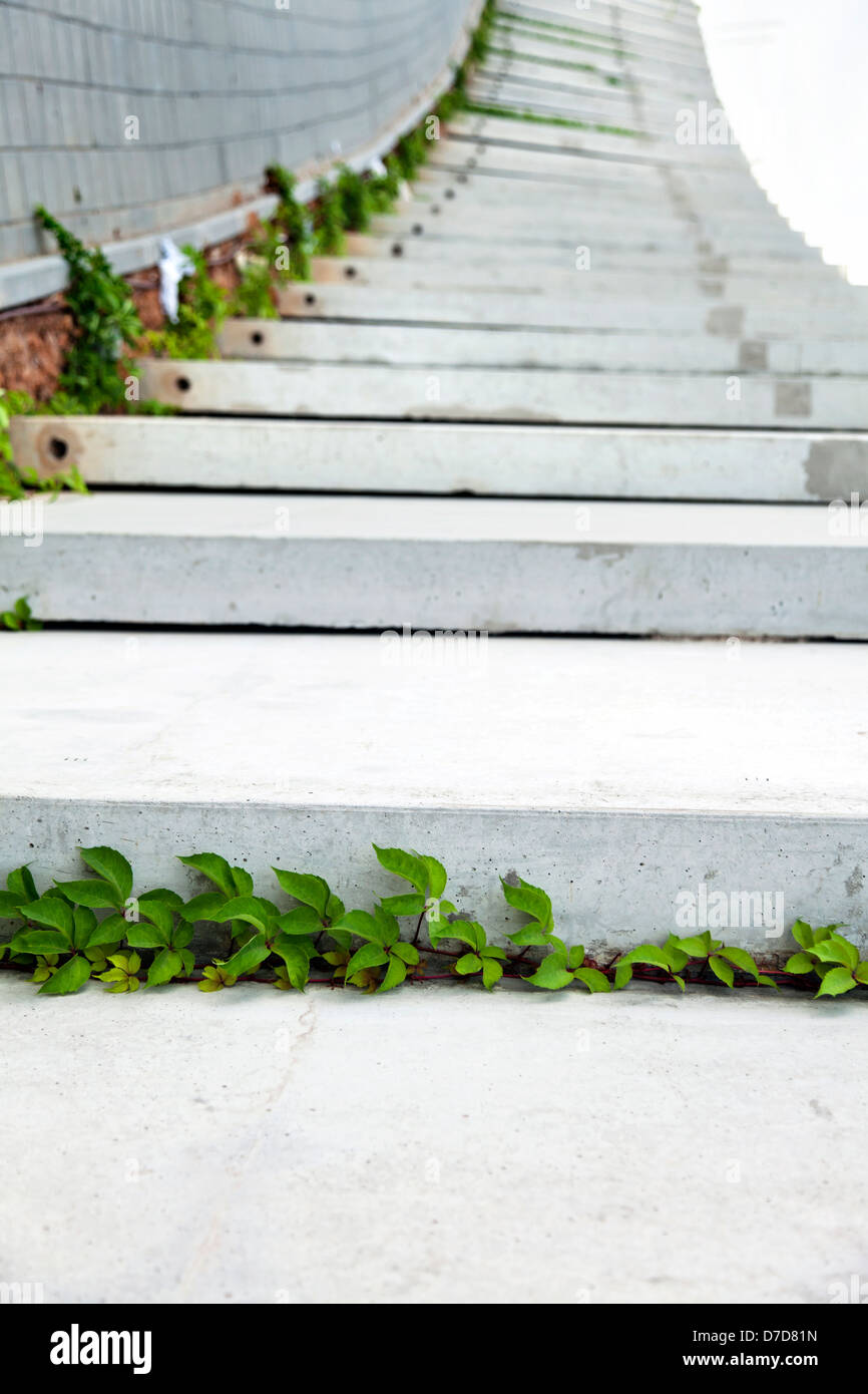 Image tilted 90°. Solid wall made of massive gray concrete plates Stock ...