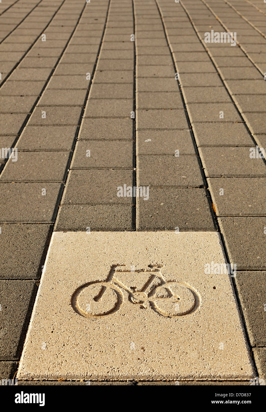Diagram of a bicycle engraved on the pavement, indicating it's a ...