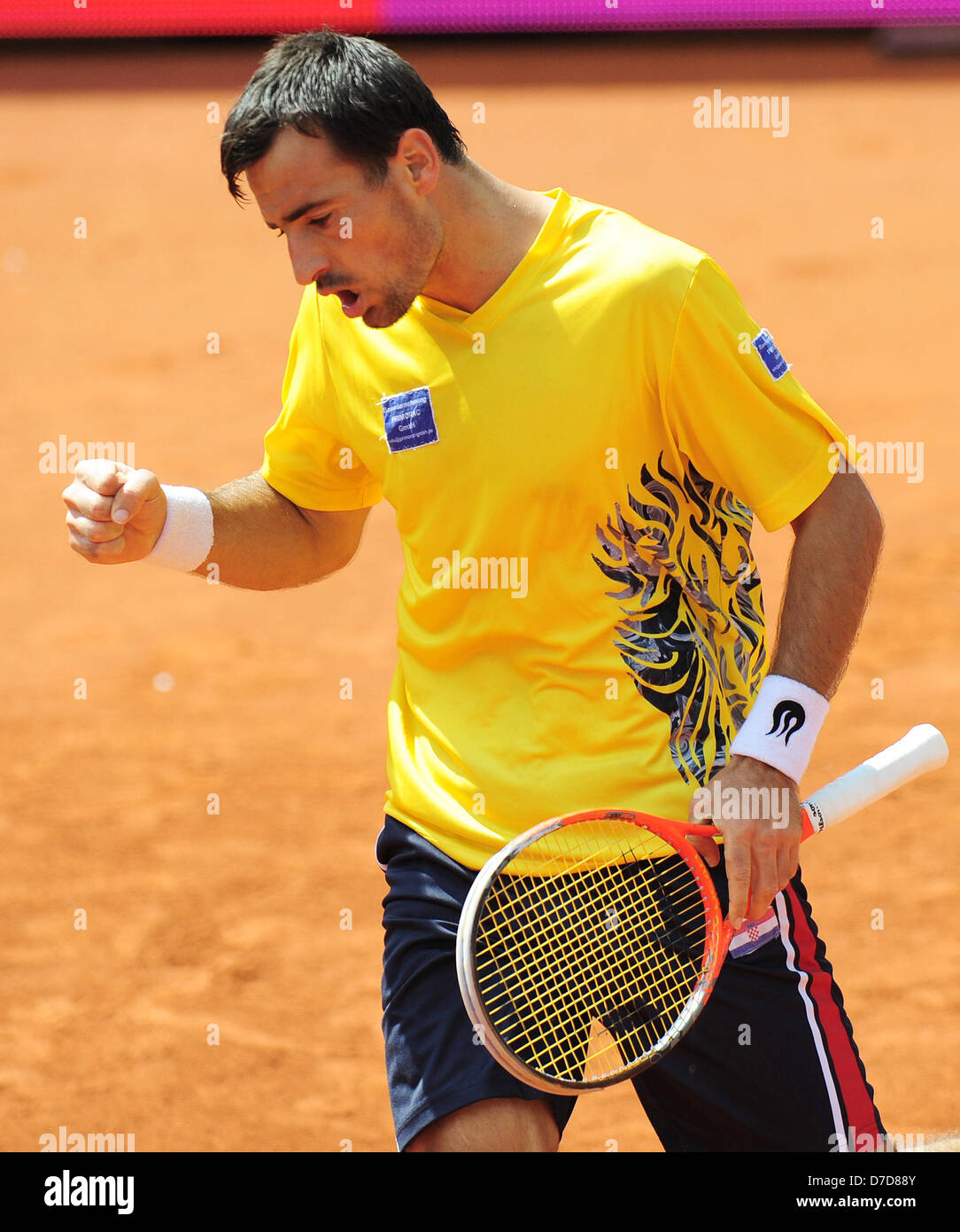 Ivan Dodig from Croatia clenches his fist during the semi-final match ...