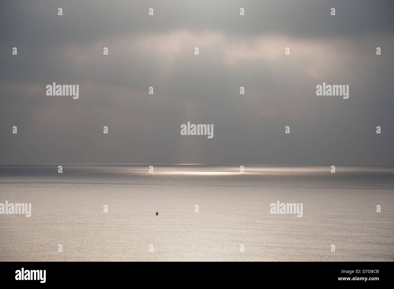 Sunlight and clouds over the ocean Stock Photo - Alamy