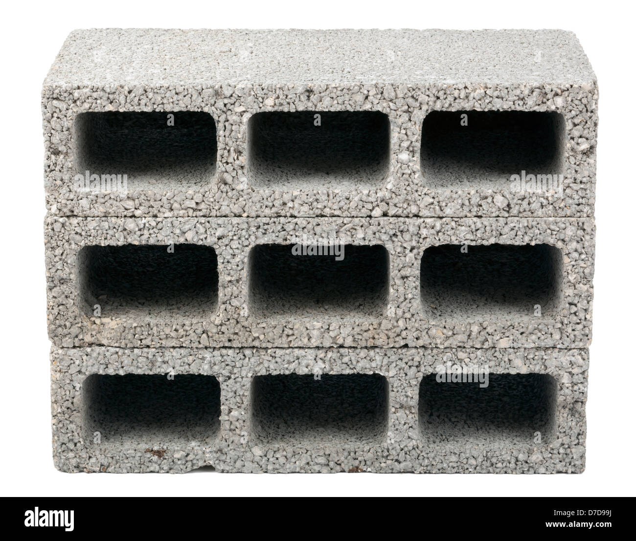 Three gray concrete construction blocks (a.k.a. cinder block breeze ...