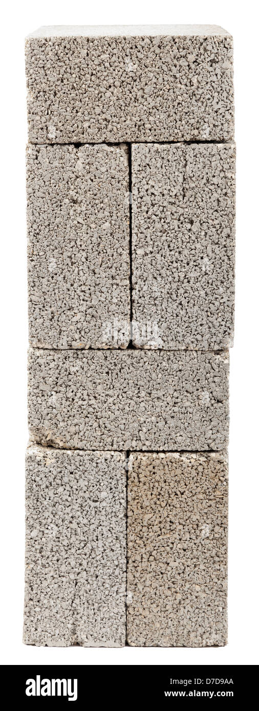 Six gray concrete construction blocks (a.k.a. cinder block breeze block ...