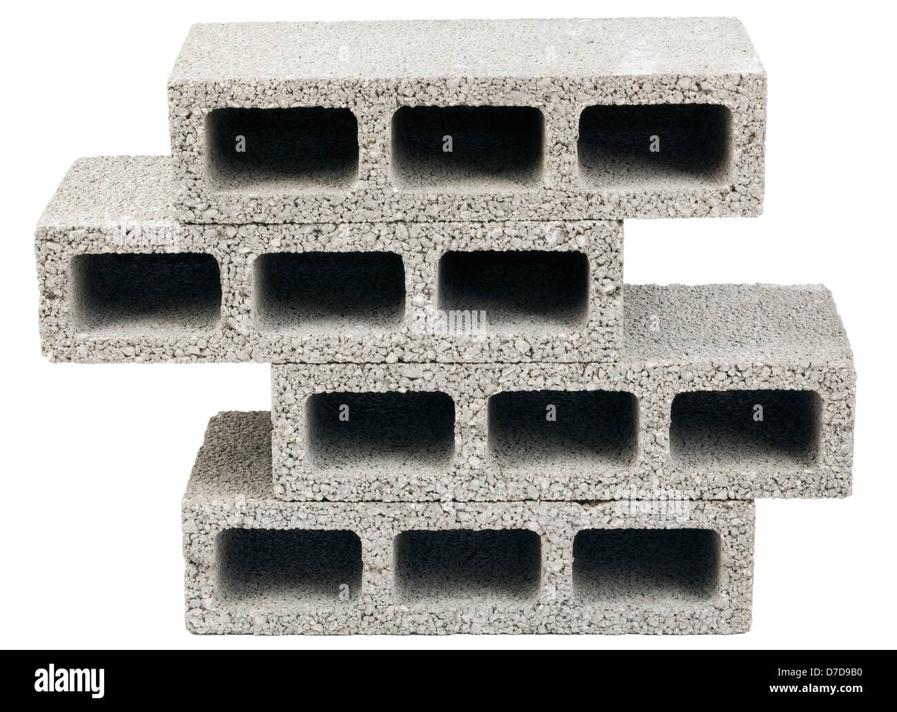 Three gray concrete construction blocks (a.k.a. cinder block breeze ...