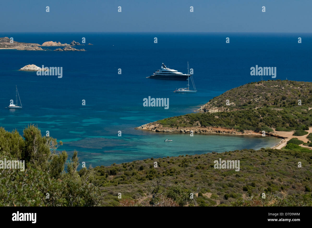 Yachts on the blue sea of Capo Malfatano coast, Teulada, Cagliari ...