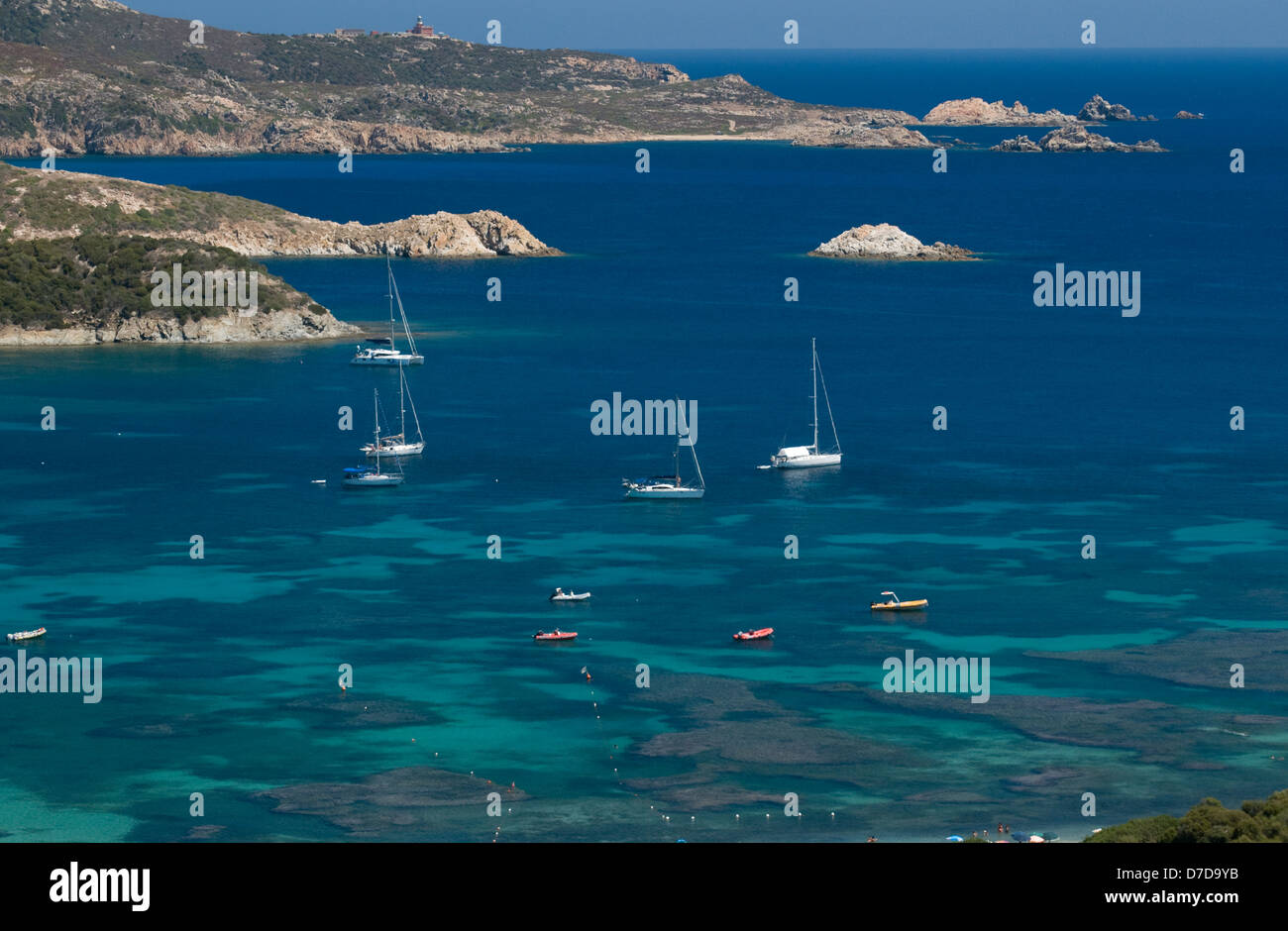 Yachts on the blue sea near Capo Spartivento, on the coast of Teulada ...