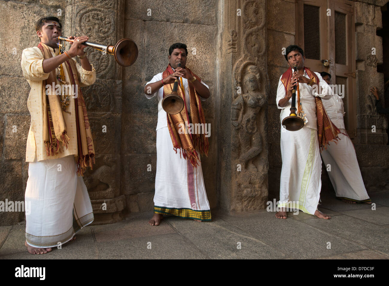 Hindu temple musicians play in the entranceway of the Chennakesava ...