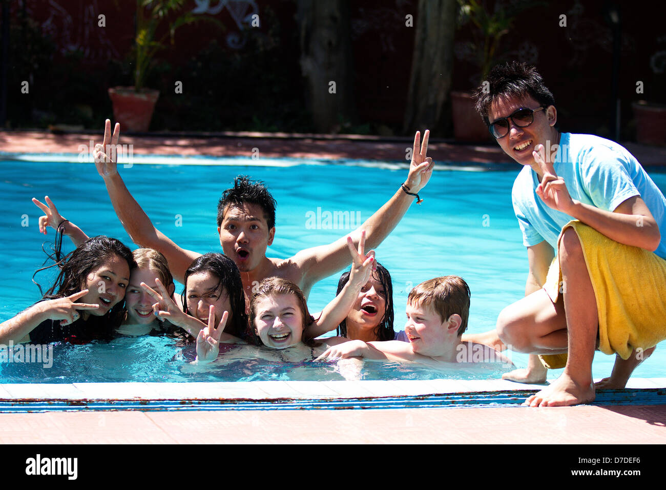 Fun at the pool Stock Photo - Alamy