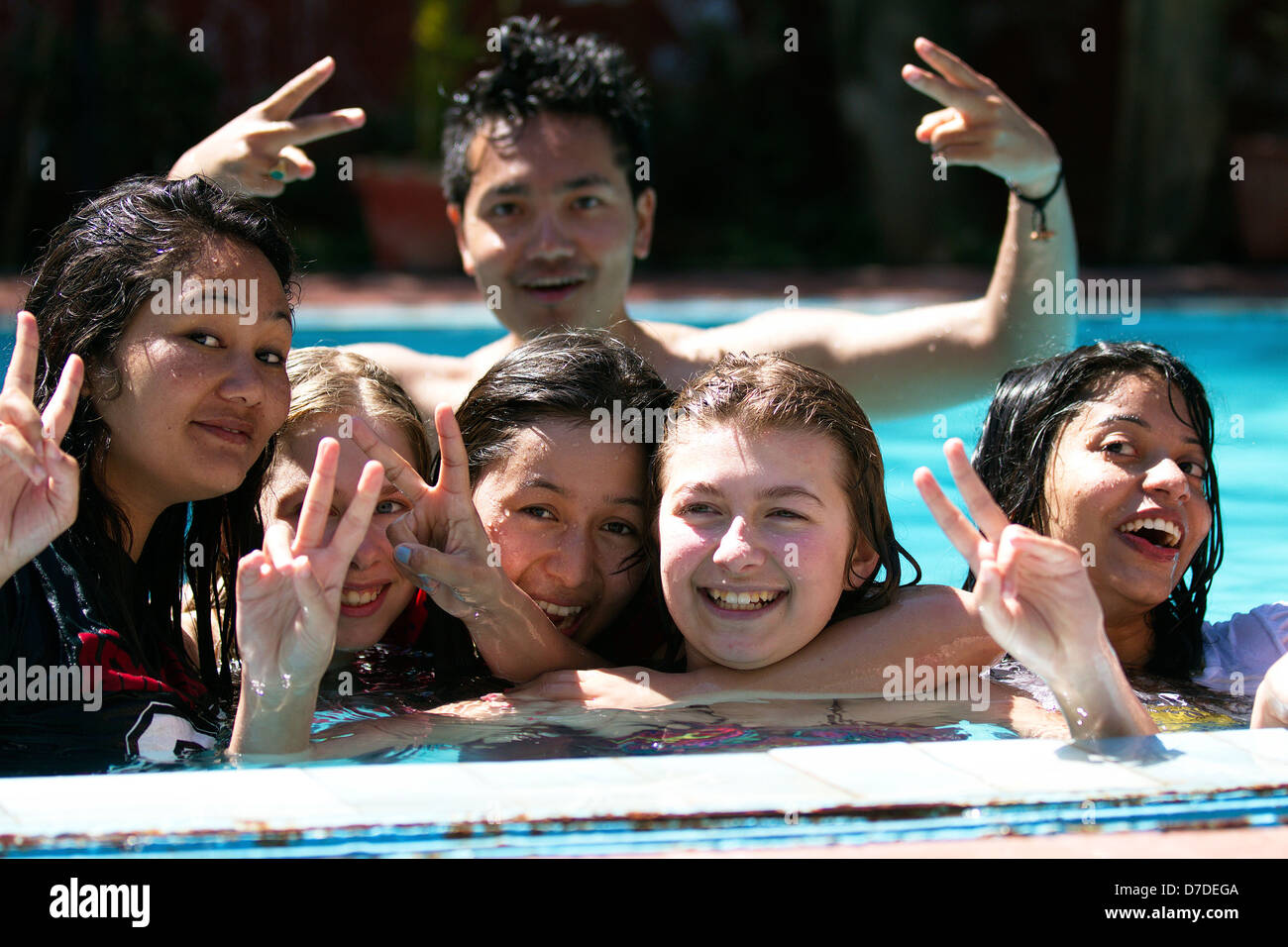 Fun at the pool Stock Photo - Alamy