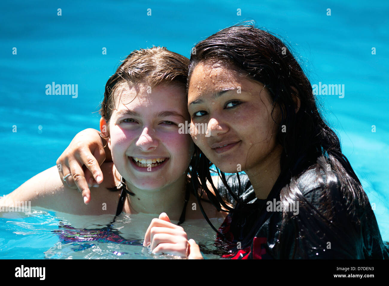 Fun at the pool Stock Photo - Alamy